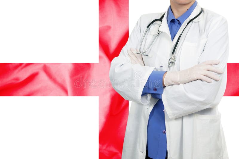 Doctor standing with flag stock photo. Image of covid19 - 230852864