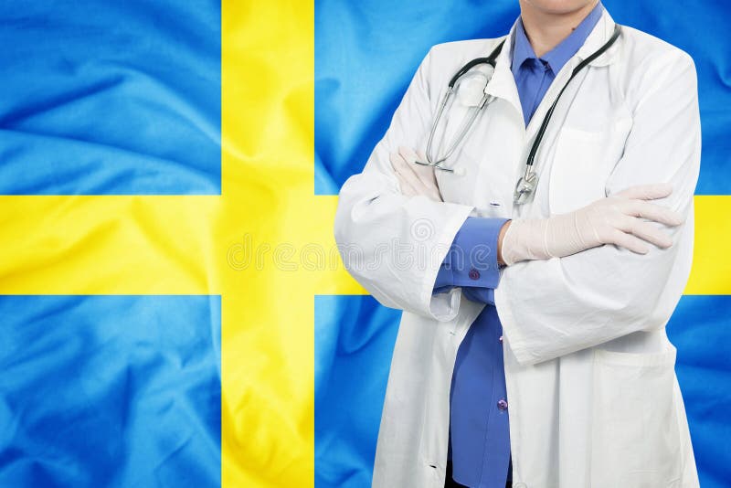 Doctor standing with flag stock image. Image of country - 233342205