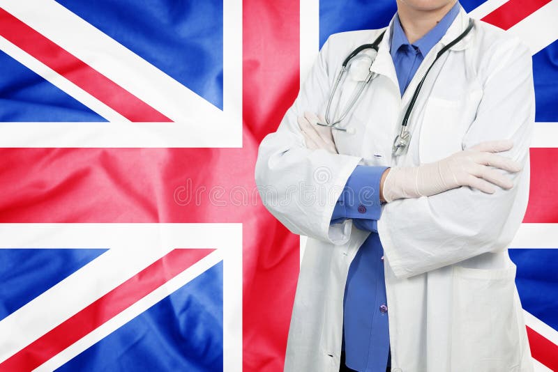 Doctor standing with flag stock image. Image of nurse - 233342223