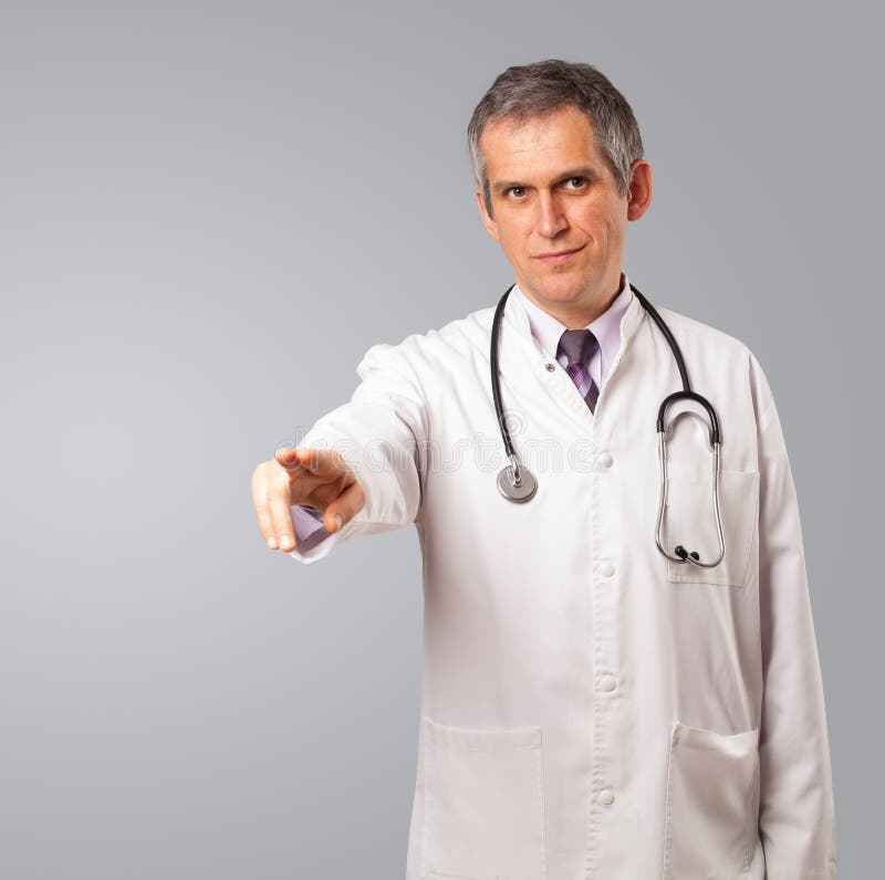 Doctor Standing and Gesturing with Copy Spaace Stock Photo - Image of ...