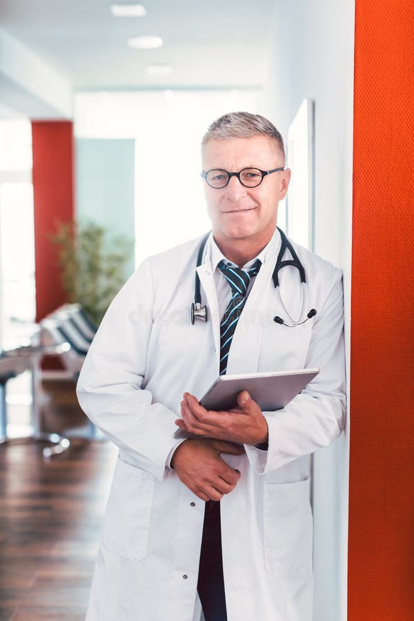 Doctor Standing in His Practice Stock Photo - Image of caucasian ...
