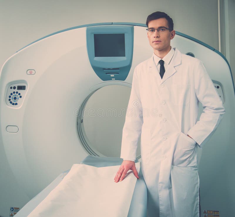Doctor Standing Near Computed Tomography Scanner in a Hospital Stock ...