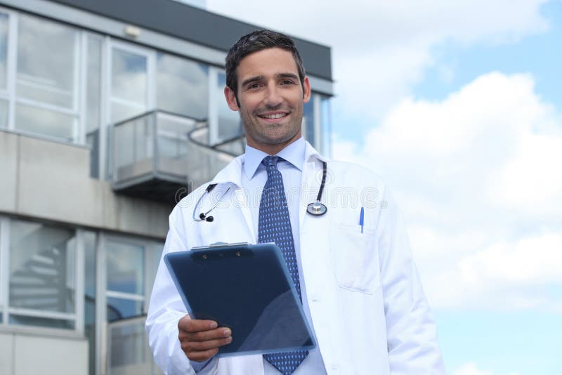 Doctor Standing Outside Hospital Stock Image - Image of male, physician ...