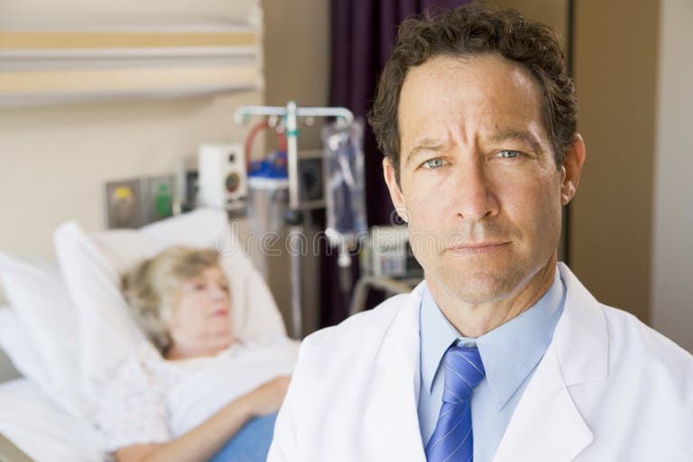 Doctor Standing in Patients Room Stock Image - Image of inside, grey ...