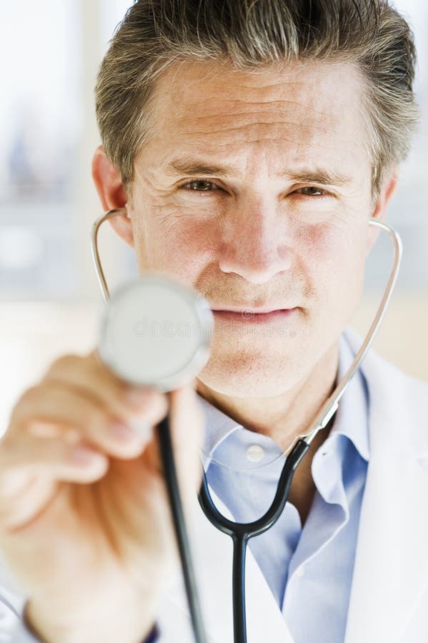 Doctor with stethescope stock image. Image of medical - 6991199