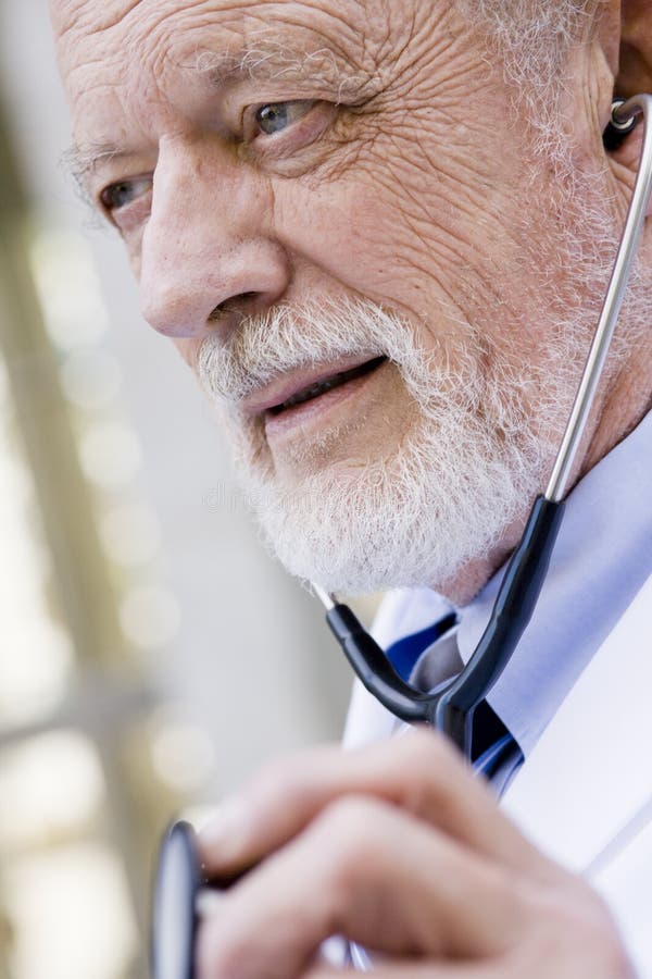 Doctor with Stethoscope stock photo. Image of confidence - 12599742