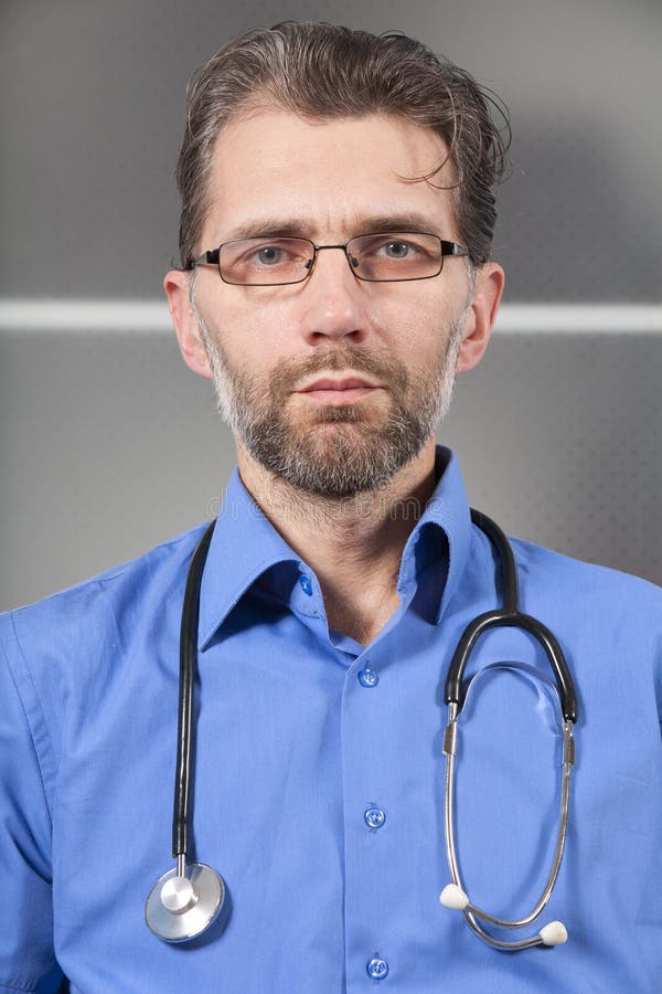 Doctor with a stethoscope stock photo. Image of face - 29543032