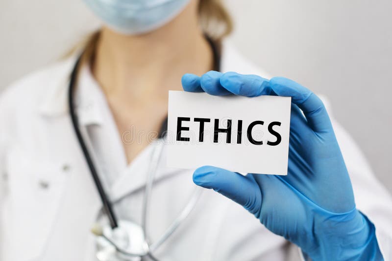 Doctor with Stethoscope Holding a Card with Text Ethics Stock Image ...