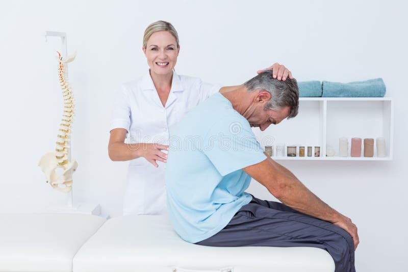 Chiropractor Stretching a Female S Leg Stock Image - Image of ...