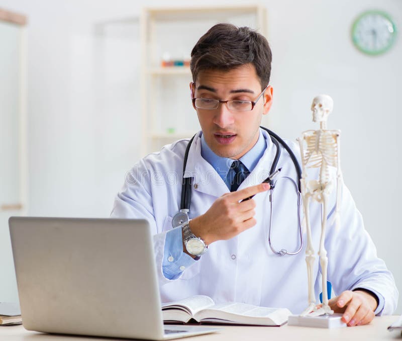 Doctor Student Studying the Bones of Skeleton Stock Photo - Image of ...