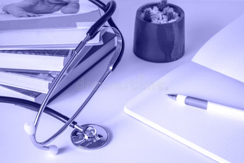 Doctor or Student Table with Stethoscope, Notepad, Books. Medical ...