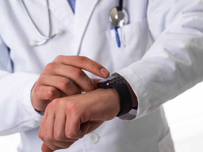 Doctor in Suit with Stethoscope Using Smart Watch while Isolated on ...