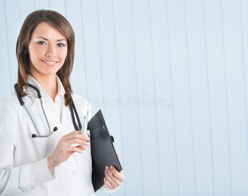 Doctor with syringe stock image. Image of clinical, happy - 10982899