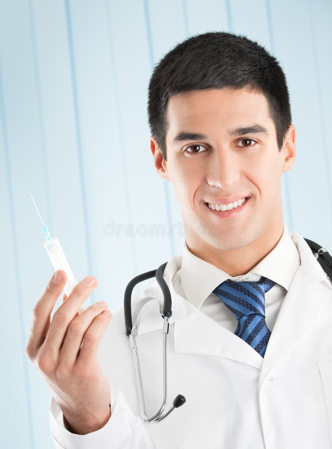 Doctor with syringe stock photo. Image of blue, document - 11072984