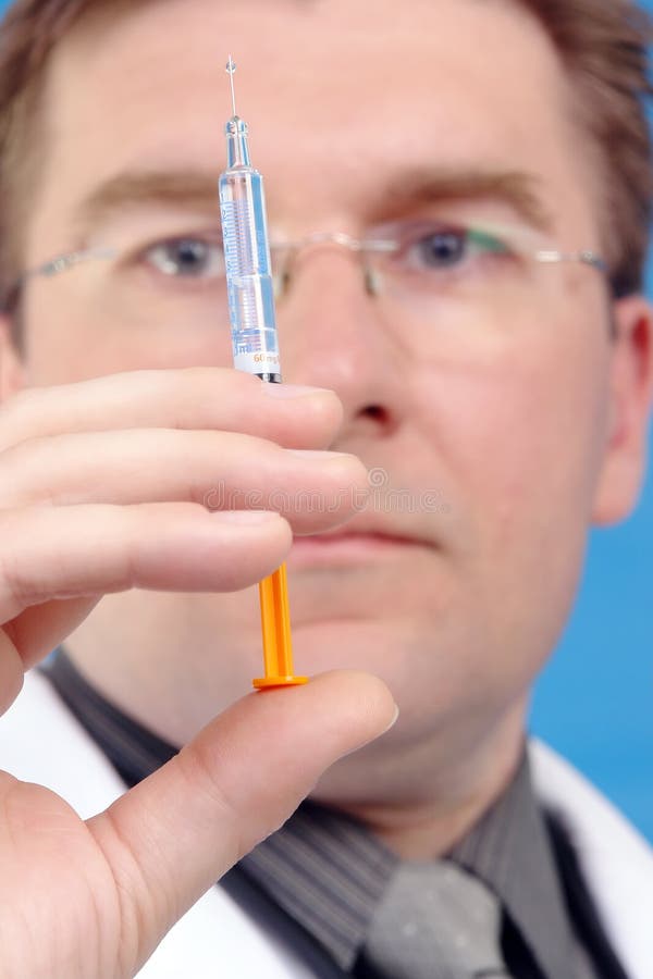 Doctor with syringe stock photo. Image of droplet, equipment - 13747210