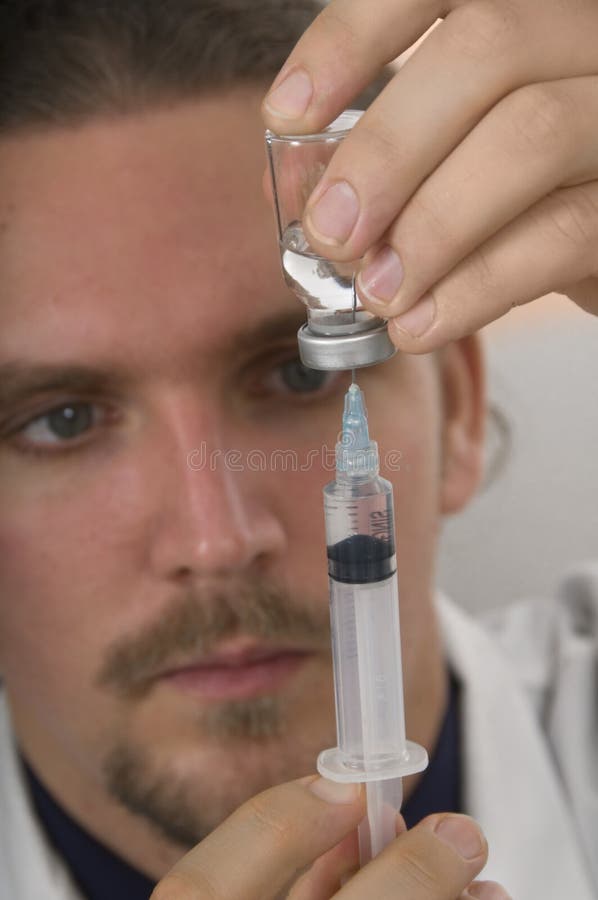 Doctor with syringe stock photo. Image of close, drugs - 13895478
