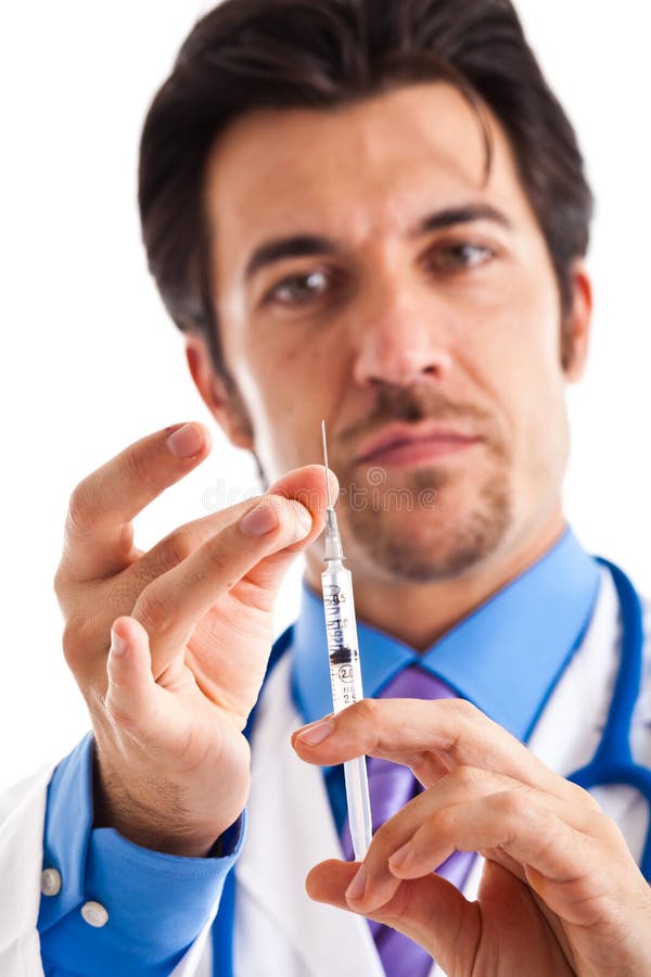 Doctor with syringe stock photo. Image of hospital, hand - 20440246