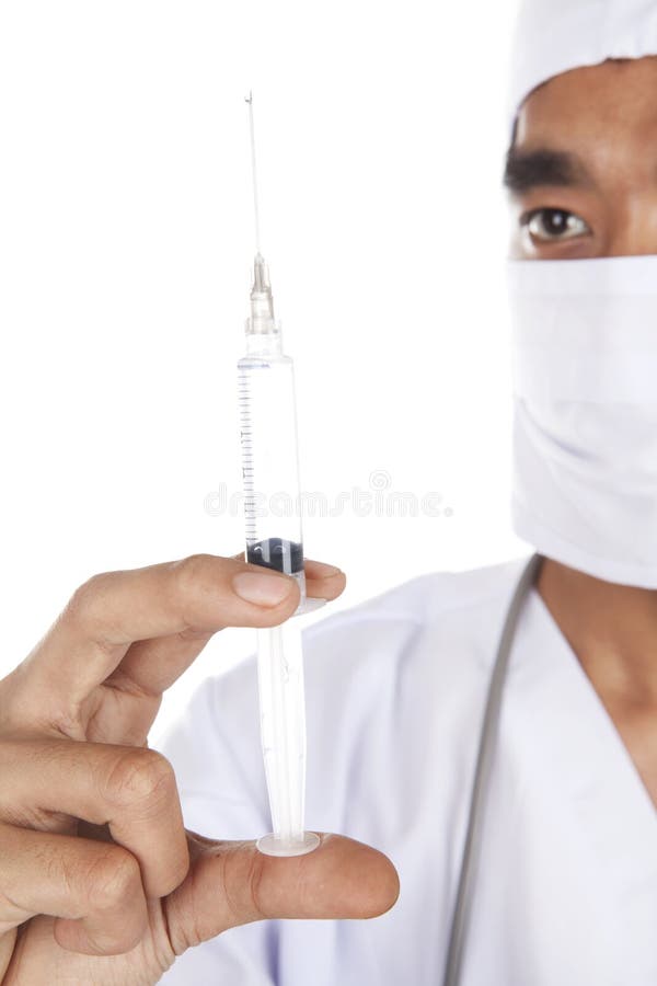 Doctor with syringe stock photo. Image of medicine, clinical - 23311006