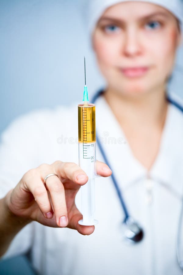 Holding Huge Syringe Stock Photos - Free & Royalty-Free Stock Photos ...