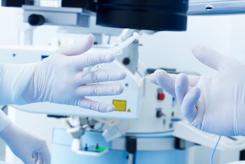 Doctor with syringe stock photo. Image of equipment, surgical - 64885702