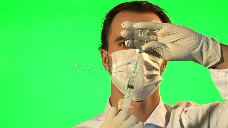 Doctor Take Off His Surgical Gloves Green Screen Stock Footage