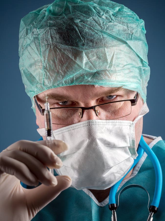 Doctor with syringe stock photo. Image of droplet, equipment - 13747210