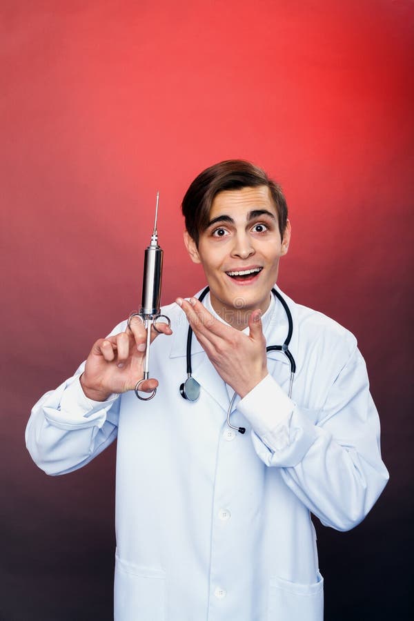 Doctor with syringe stock photo. Image of healthcare - 48748140