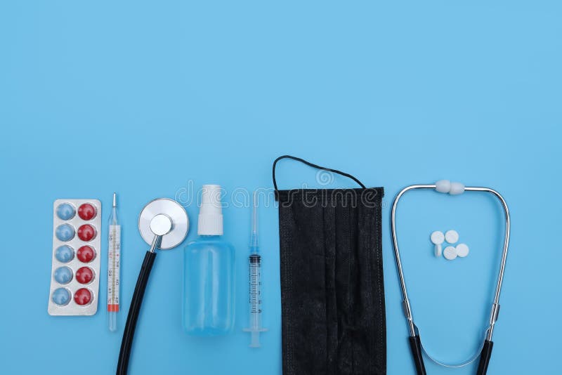 Doctor Table with Medical Items on Blue Background. Flat Lay. Medical ...