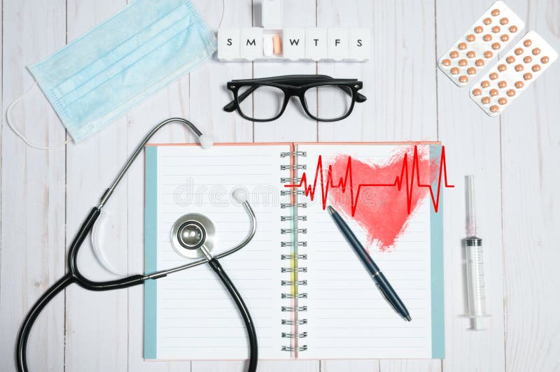 Doctor Table with Medical Items, Stethoscope and Pills Stock Photo ...