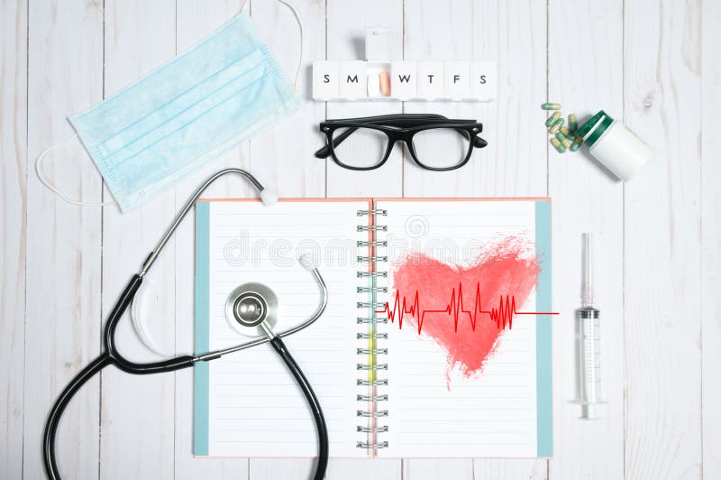 Doctor Table with Medical Items, Stethoscope and Pills Stock Photo ...