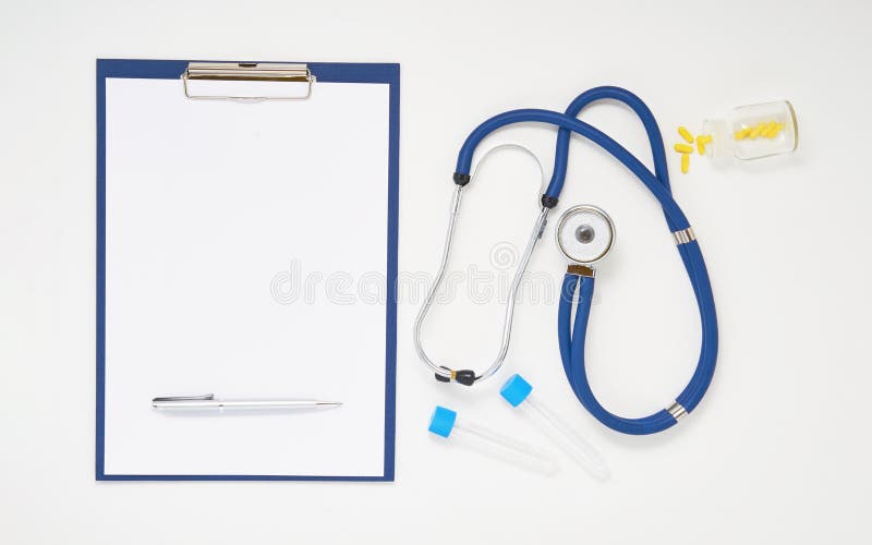 Doctor Table With Medicines Stethoscope Clipboard And Pen Top View