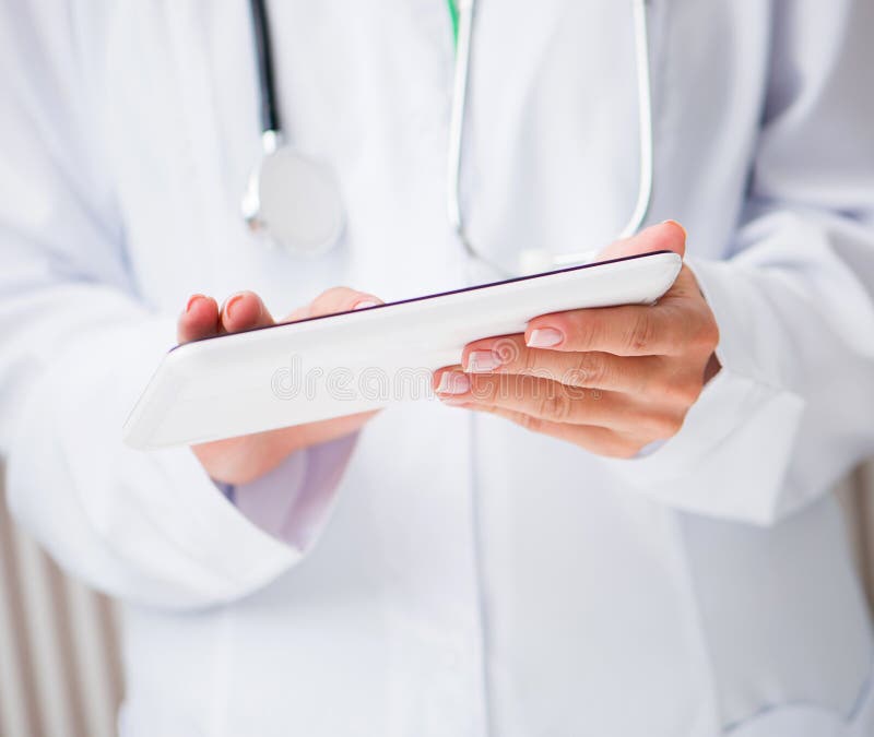 Female Asian Doctor Talking with African American Doctor with Tablet ...