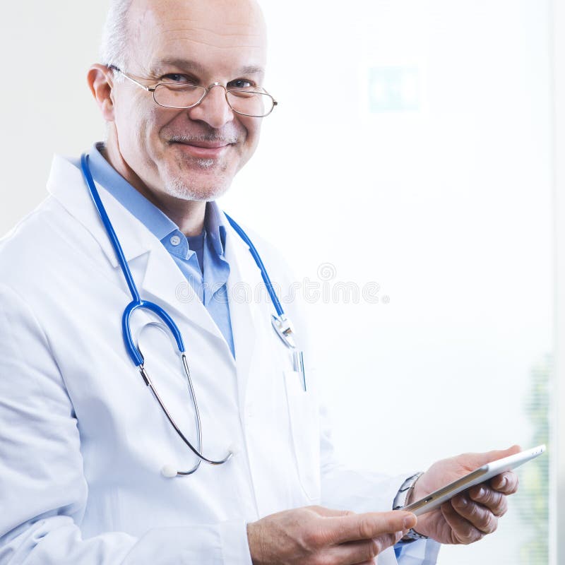 Doctor with tablet stock photo. Image of screen, clinic - 46630406