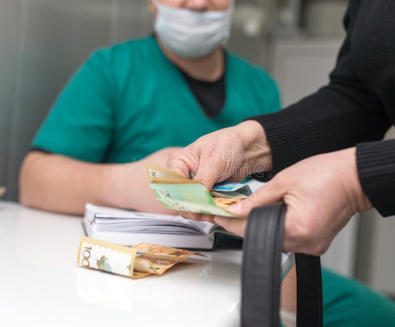 The Doctor Takes Money from the Patient Stock Image - Image of medicine ...