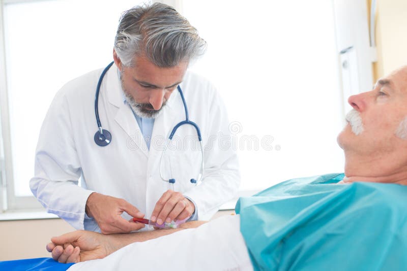 Doctor Taking Blood Sample Patient in Medical Office Stock Photo ...