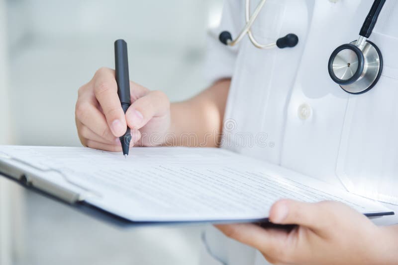 Doctor Taking Note on Checklist Paper. Stock Photo - Image of ...