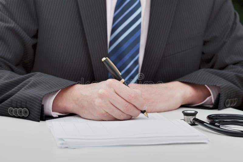 Doctor taking notes stock photo. Image of document, exam - 39905438