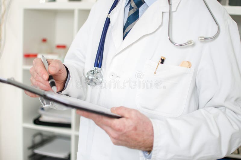 Doctor taking notes stock image. Image of doctors, reporting - 47212551