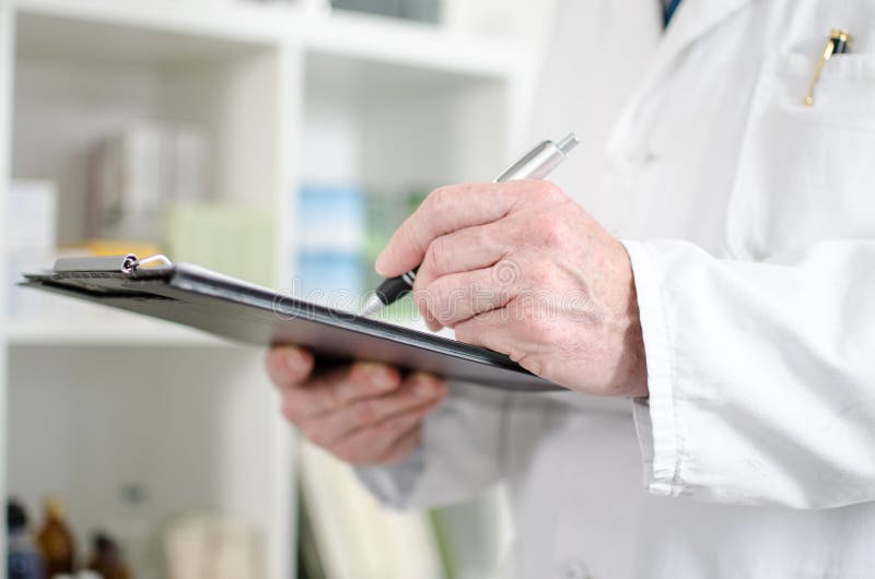 Doctor taking notes stock photo. Image of notes, diagnosis - 47212902