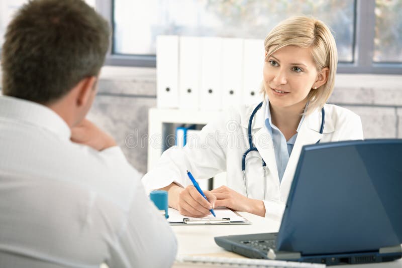 Doctor Taking Notes about Patient Stock Photo - Image of bright ...