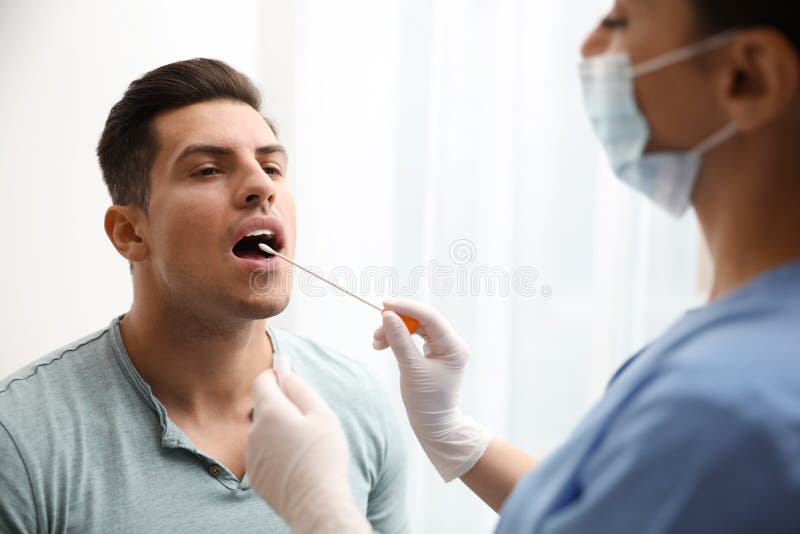 Doctor Taking Test Tube with Urine Sample for Analysis at Table ...