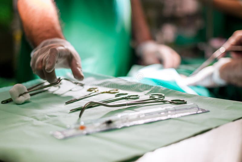 Doctor Taking Surgery Tools from the Table Stock Photo - Image of ...