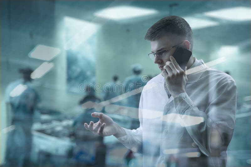 Doctor Talking on the Phone during Operation Stock Photo - Image of ...