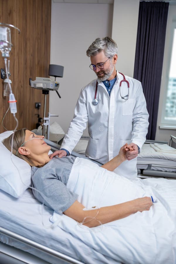 Doctor Talking To a Patient in Clinic and Looking Involved and ...