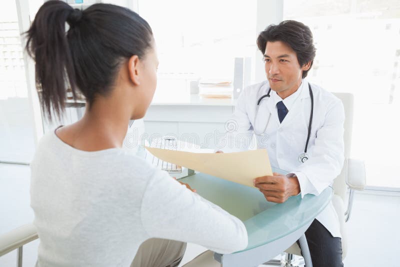 Doctor Telling Patient Her Results Stock Image - Image of medicine ...