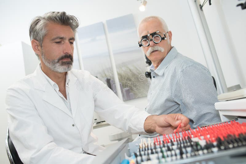 Doctor Testing Different Eye Test Lens Stock Image - Image of doctor ...