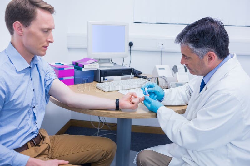 Doctor Testing His Patients Blood Stock Image - Image of care ...