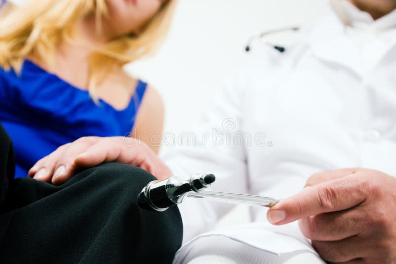 Doctor testing reflexes stock image. Image of woman, illness - 6763057
