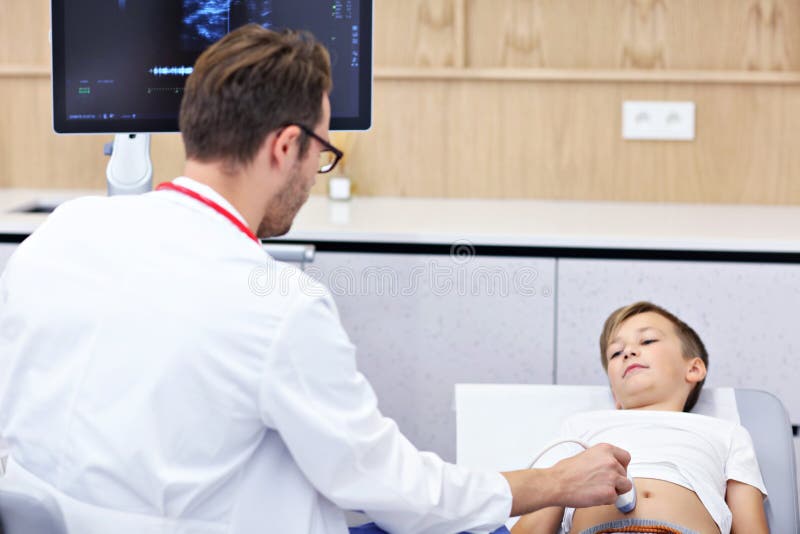 Doctor Testing Young Boy with Usg Stock Image - Image of people, belly ...