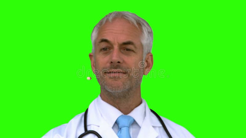 Doctor Throwing a Pill in the Air on Green Screen Stock Footage - Video ...